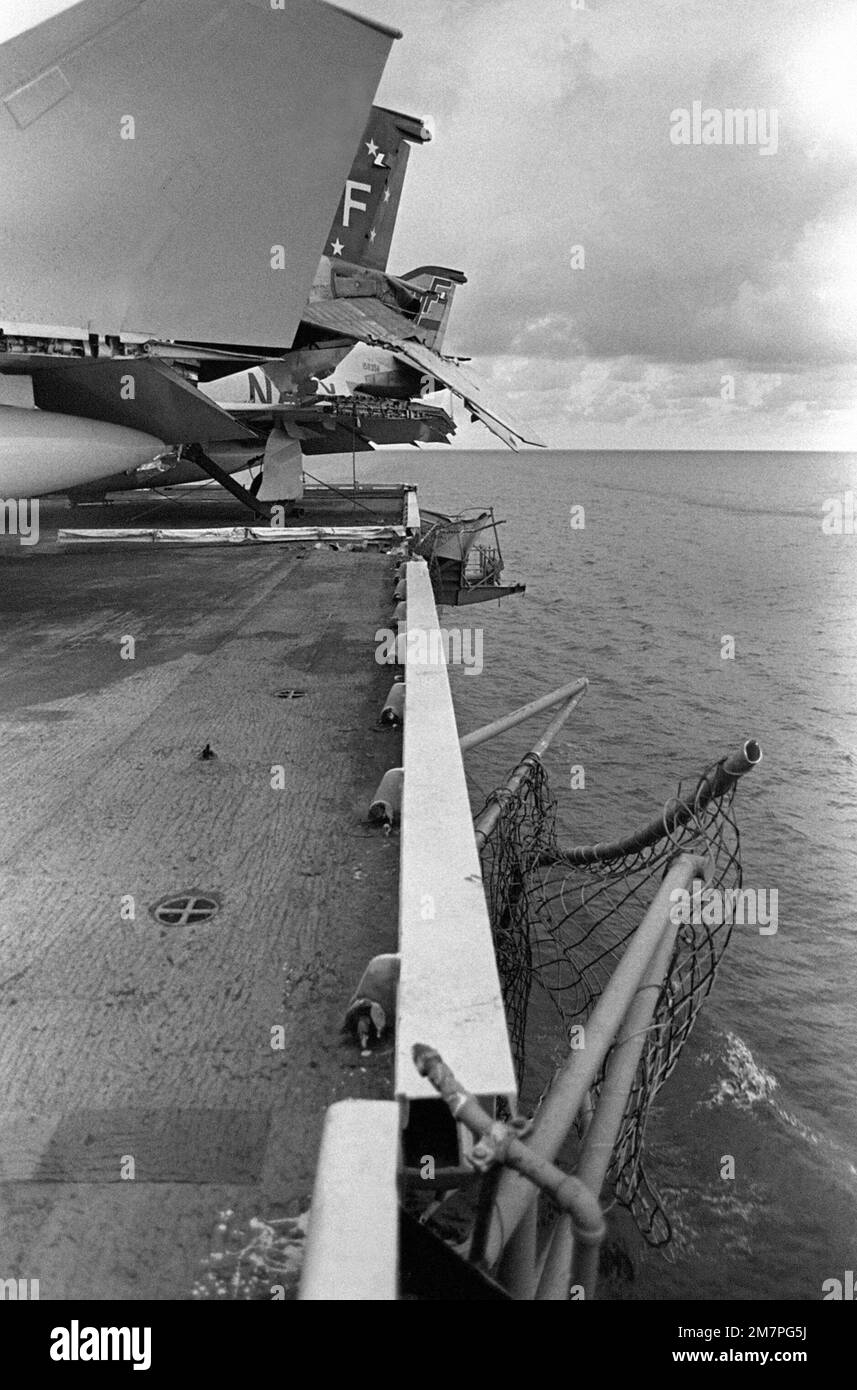 A view of damage caused to two F-4 Phantom II aircraft that were parked ...