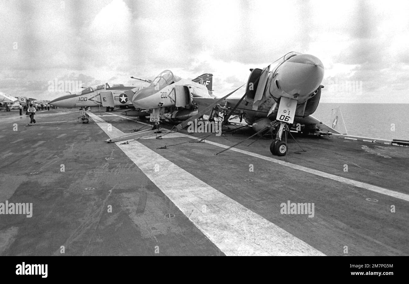 A view of damage caused to several F-4 Phantom II aircraft that were parked on the port side ...