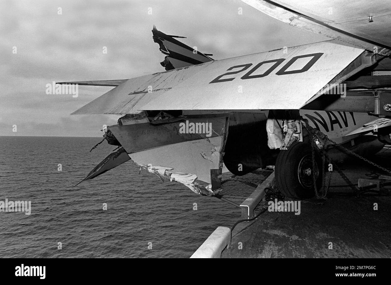 A view of damage caused to an F-4 Phantom II aircraft that was parked ...