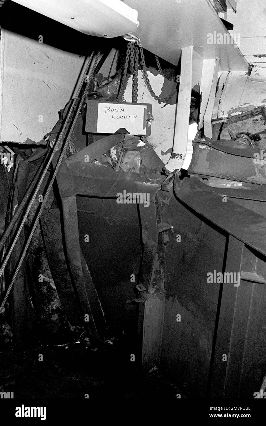 An interior view of damage caused to the aircraft carrier USS MIDWAY ...