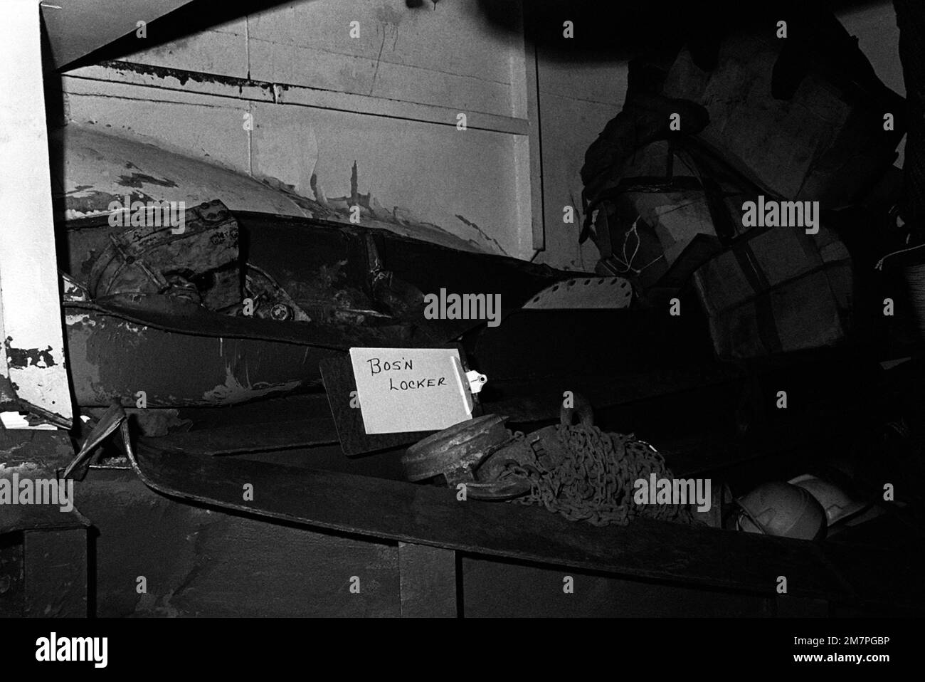 An interior view of damage caused to the aircraft carrier USS MIDWAY ...