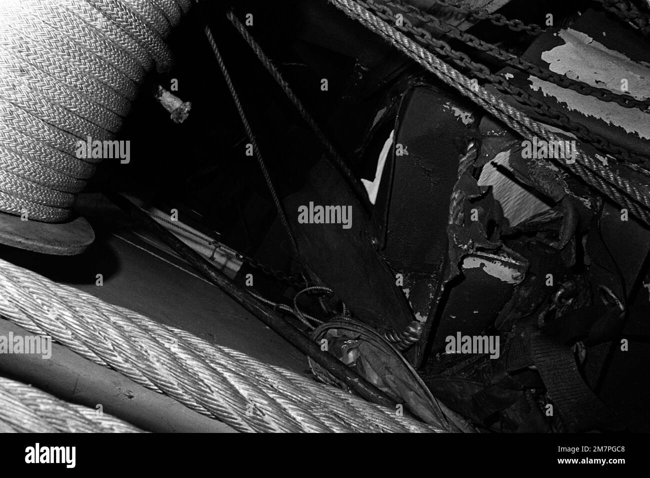 An interior view of damage caused to the aircraft carrier USS MIDWAY ...