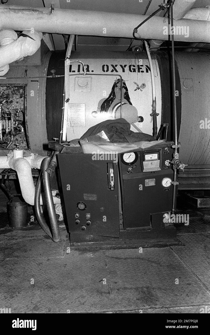 An interior view of damage caused to the aircraft carrier USS MIDWAY ...