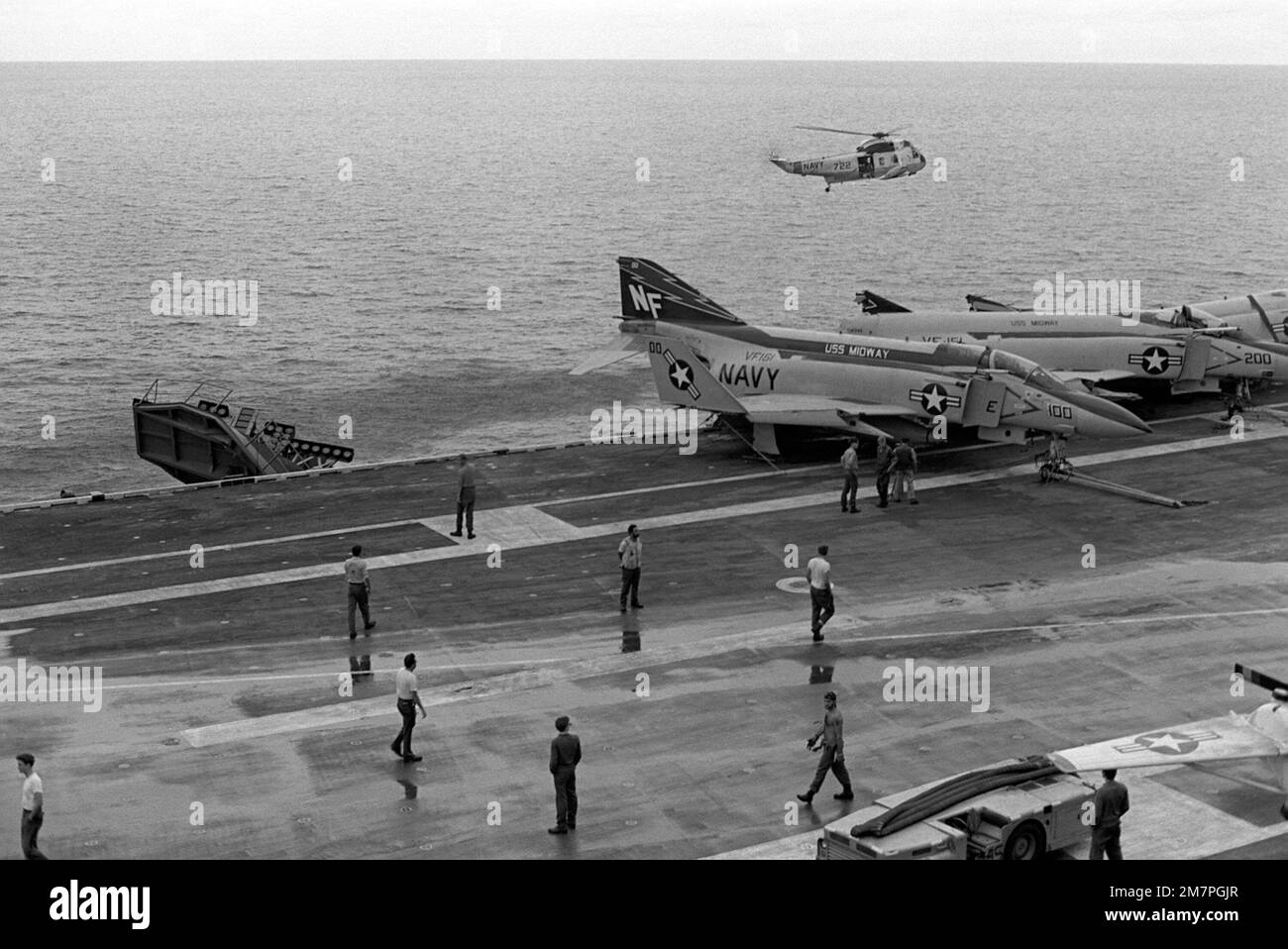 A view of damage caused to three F-4 Phantom II aircraft and the ...