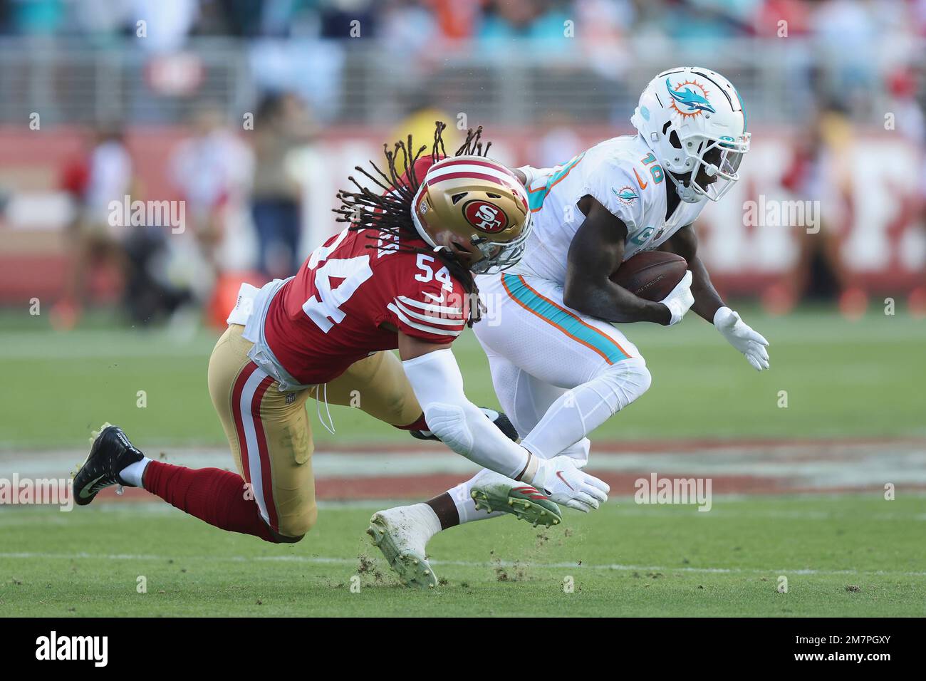 Miami Dolphins wide receiver Tyreek Hill (10) is tackled by San ...