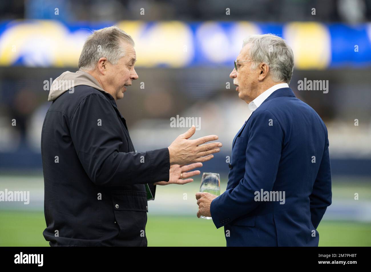 Los Angeles Rams owner Stan Kroenke, right, talks to Seattle Seahawks ...