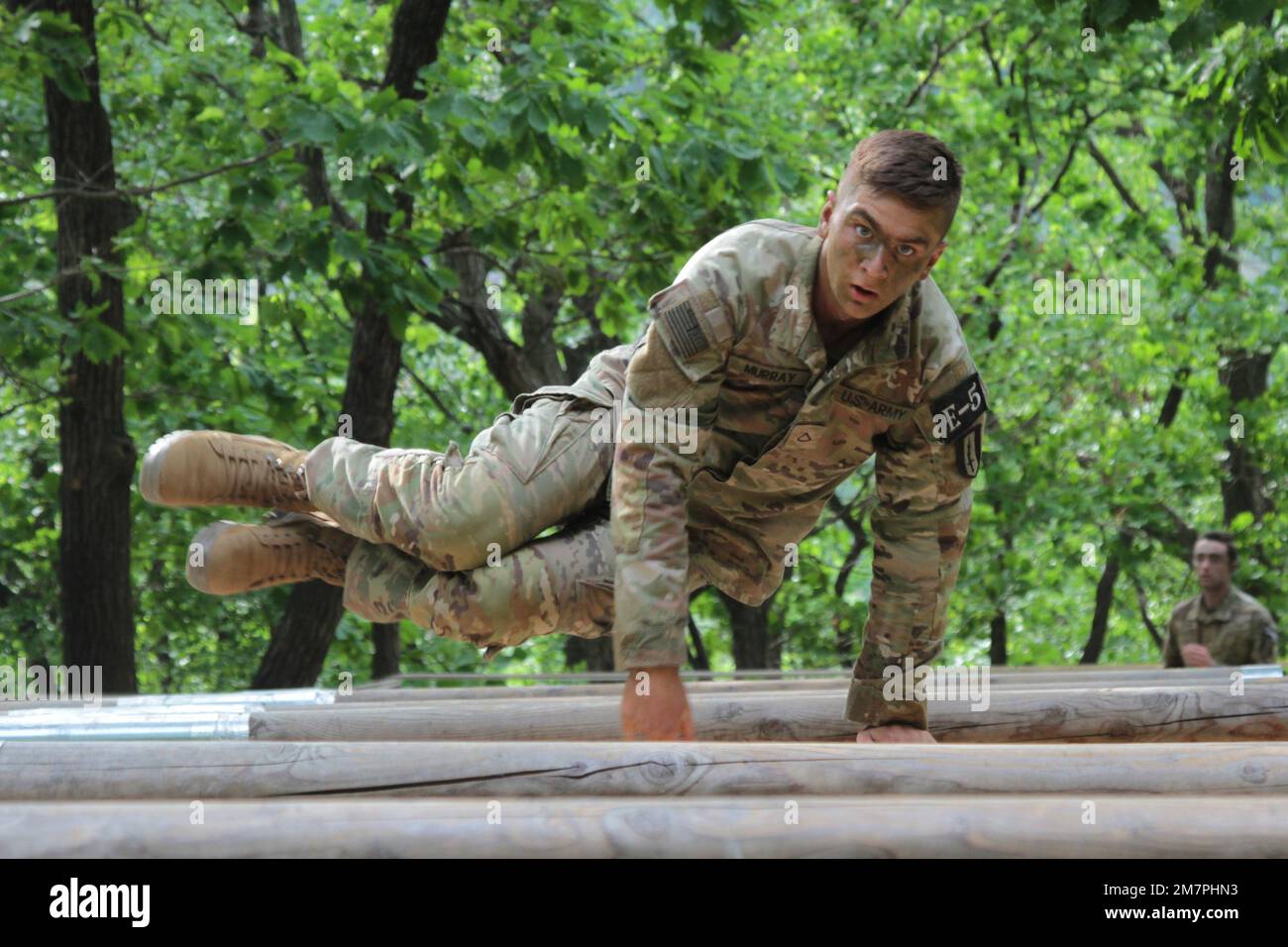 U.S. Army Pfc. Nolan Murray, vaults over an obstacle during the Eighth ...