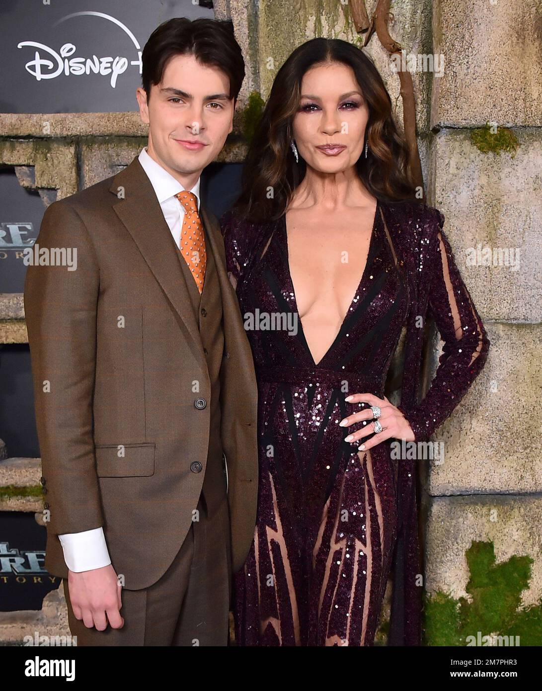 Dylan Michael Douglas, left, and Catherine Zeta-Jones arrive at a red ...