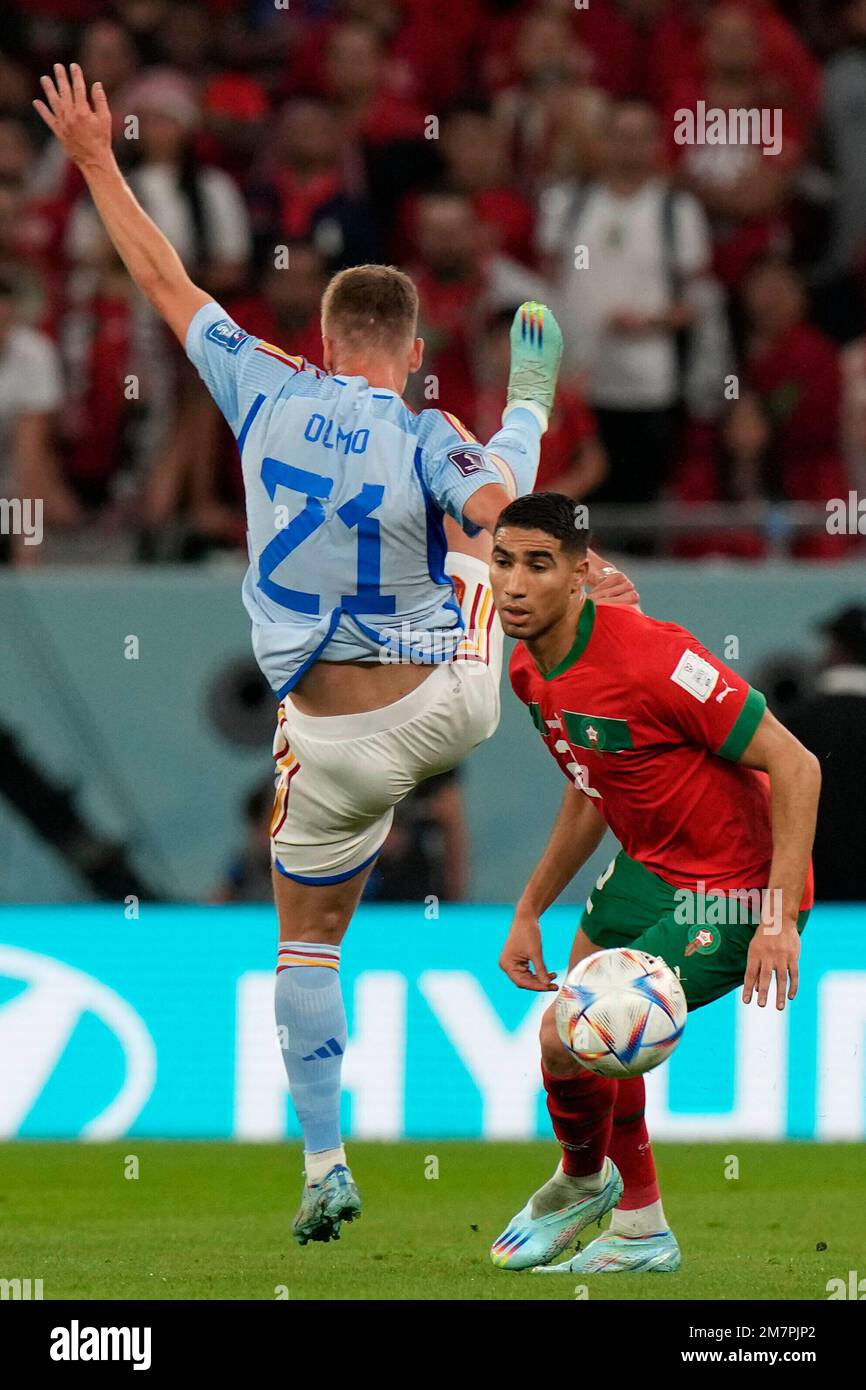 Spain's Dani Olmo, left, and Morocco's Achraf Hakimi challenge for the ...