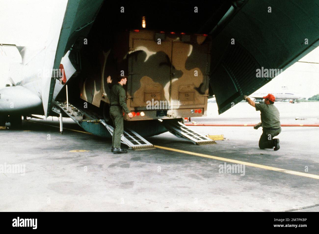 An Aerospace Audiovisual Service (AAVS) television van is offloaded ...