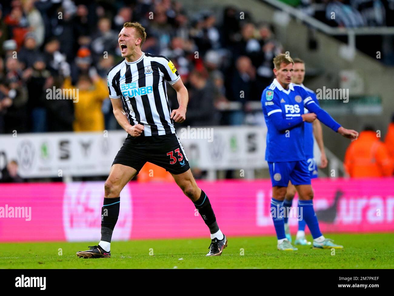 Newcastle United's Dan Burn celebrates scoring their side's first goal ...