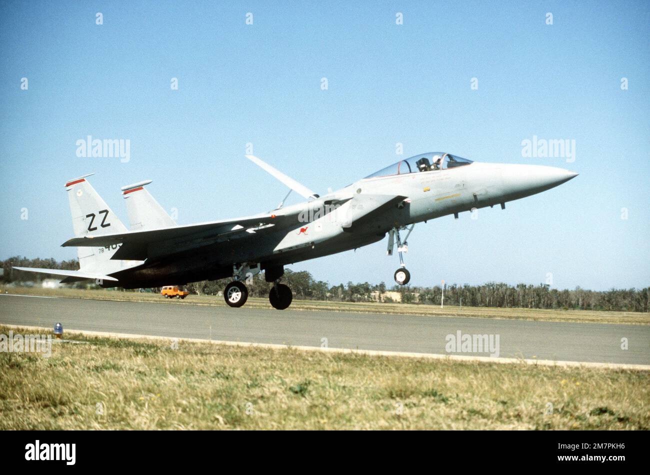 A right side view of an F-15 Eagle aircraft landing with the speed ...