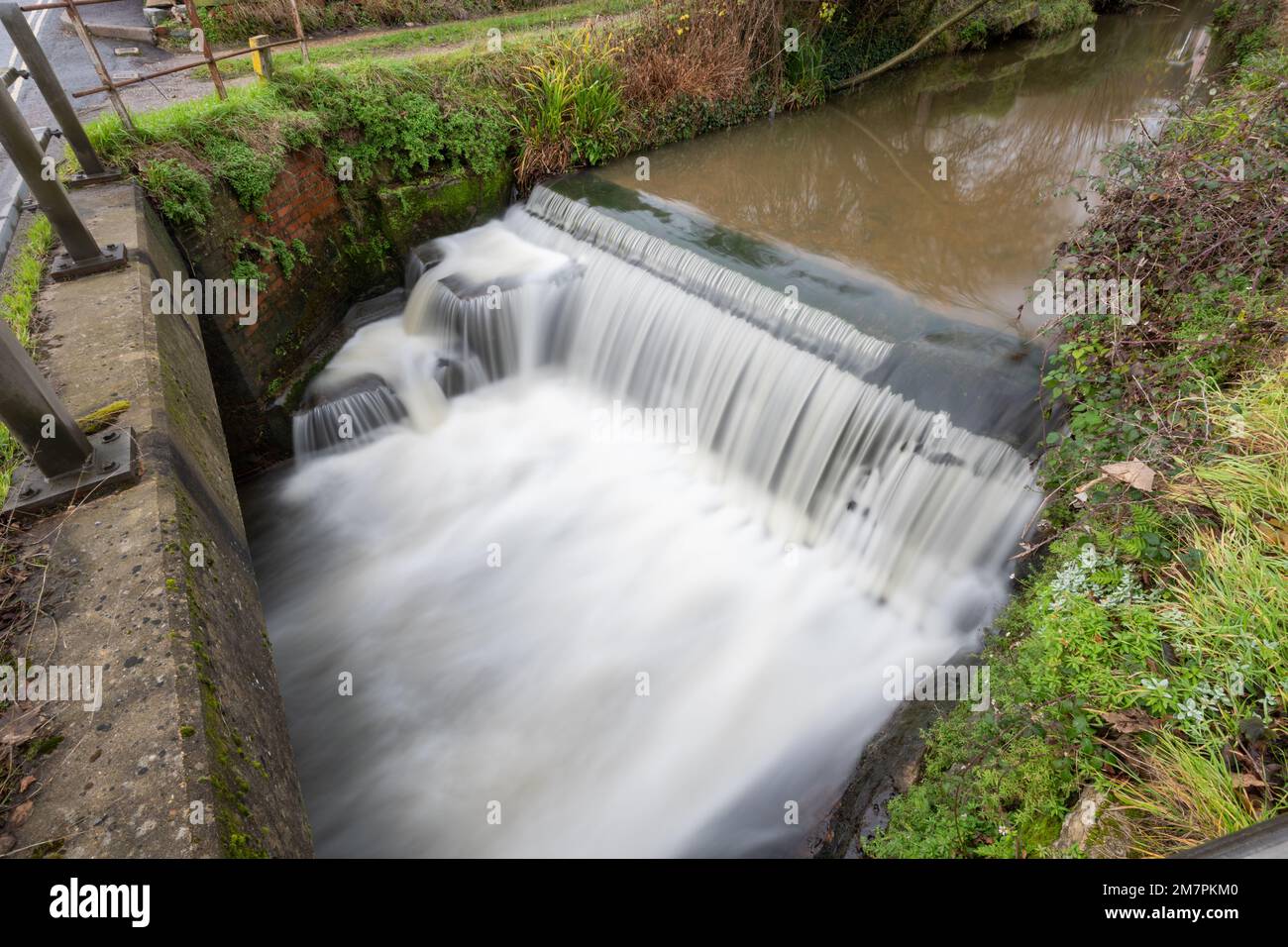 Long exposure of a watefall on the River Lim walkway at Lyme Regis in ...
