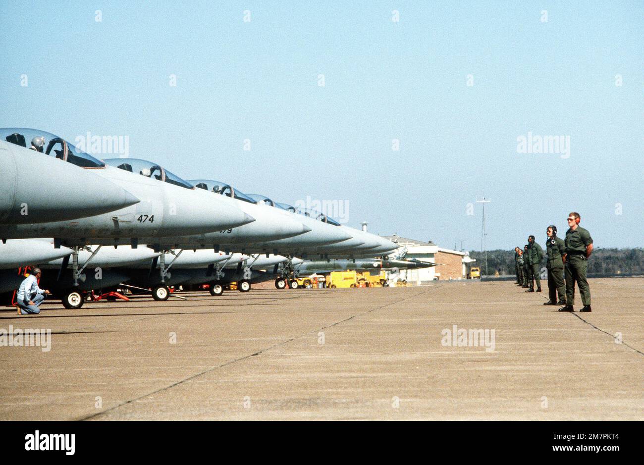 AN F-15 Eagle aircraft are being readied for launch during exercise ...