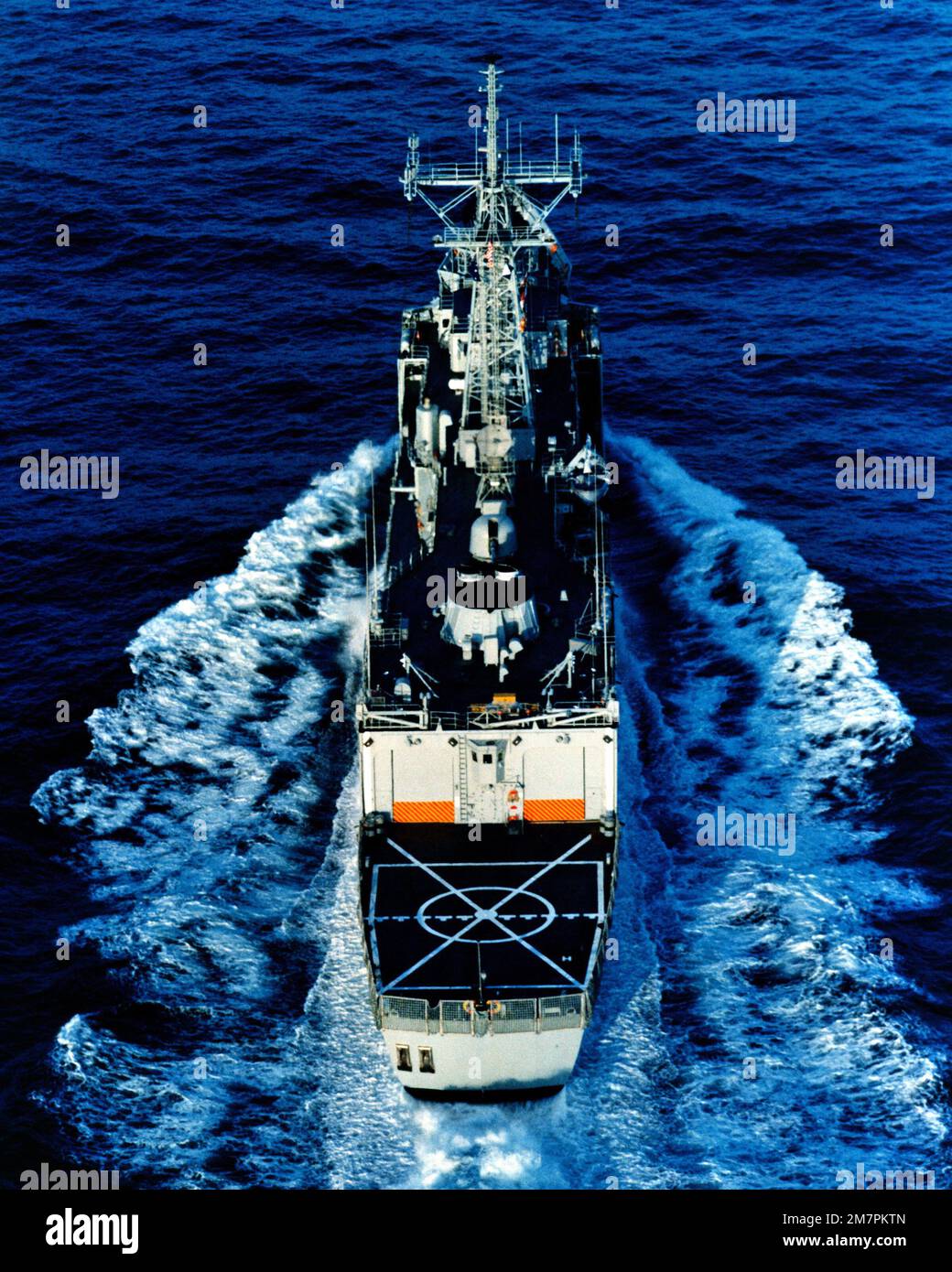 An aerial stern view of the Australian frigate ADELAIDE (F-01) as Todd ...
