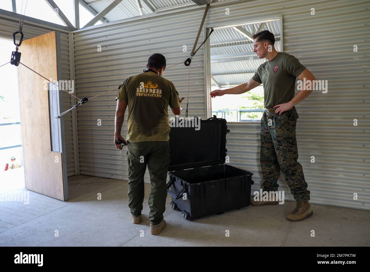 U.S. Marine Corps Sgt. Tyler Foutz, an explosive ordnance disposal (EOD) technician with 1st EOD ...