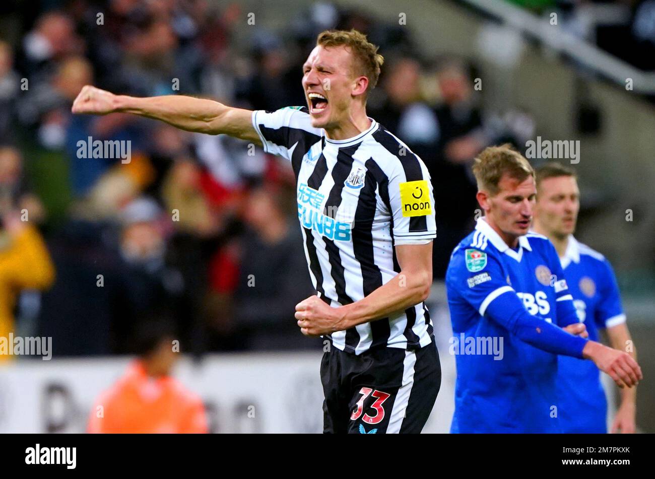 Newcastle United's Dan Burn celebrates scoring their side's first goal ...
