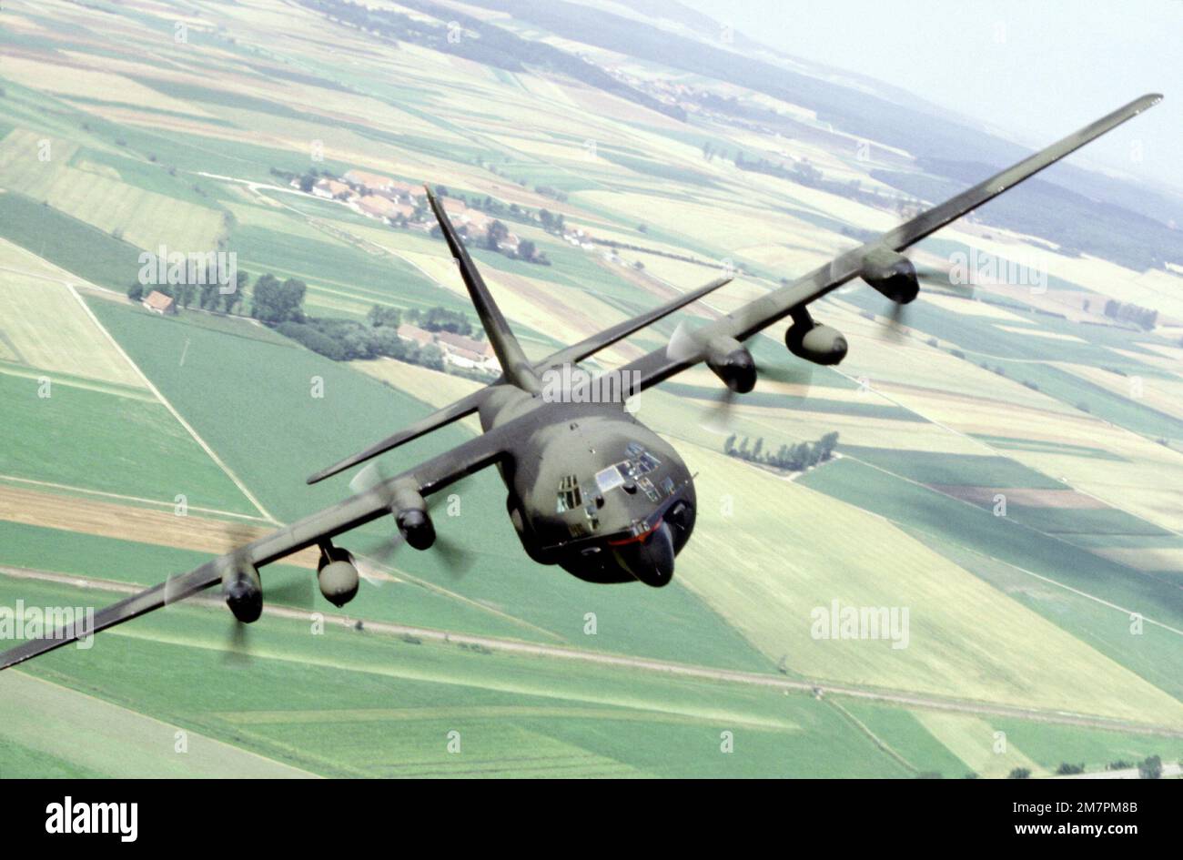 An air-to-air front view of an MC-130E Hercules Combat Talon aircraft ...
