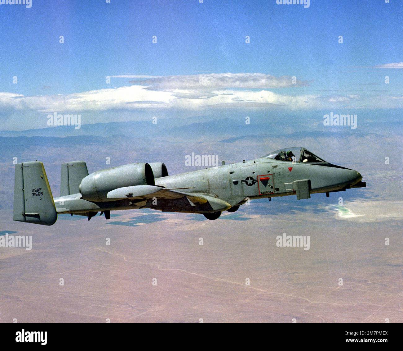 AN air-to-air right side view of an A-10 Thunderbolt II aircraft during ...