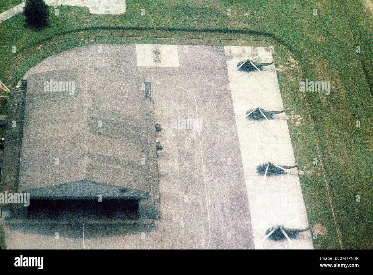 Aerial view of a hangar and ramp area. Base: Kuantan Air Base Country ...