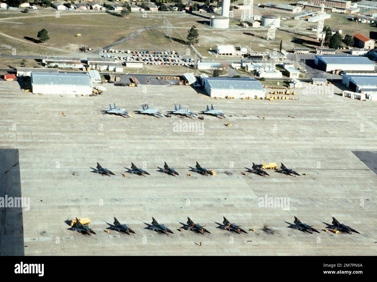 Aerial view of hangars and ramp area, where F-15 Eagle (nearest the ...