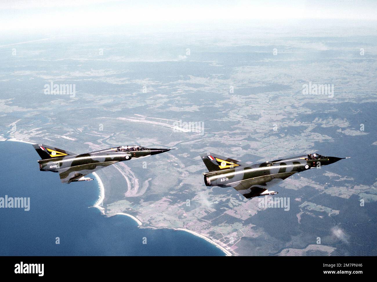 A right side view of two Royal Australian Air Force aircraft. The front ...
