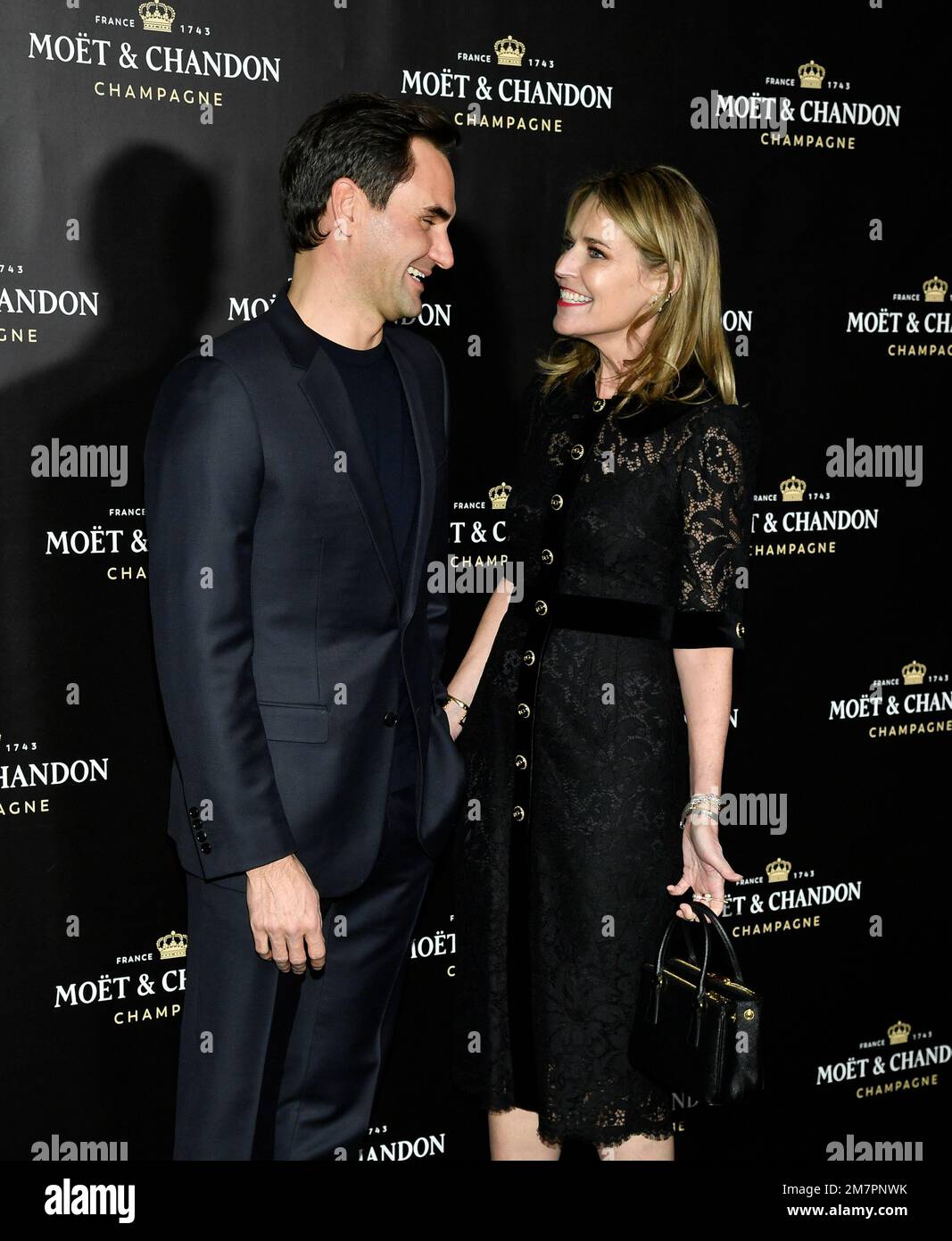 Roger Federer, left, and Savannah Guthrie attend the Moet & Chandon ...