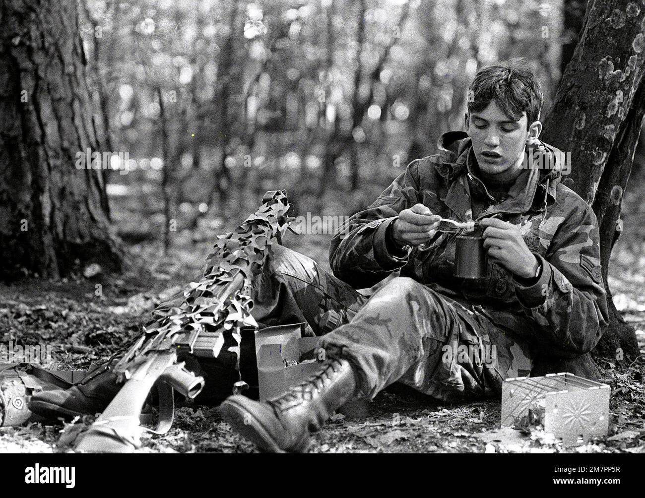 A1C Todd Adkins 435th Security Police Squadron, takes a dinner break ...