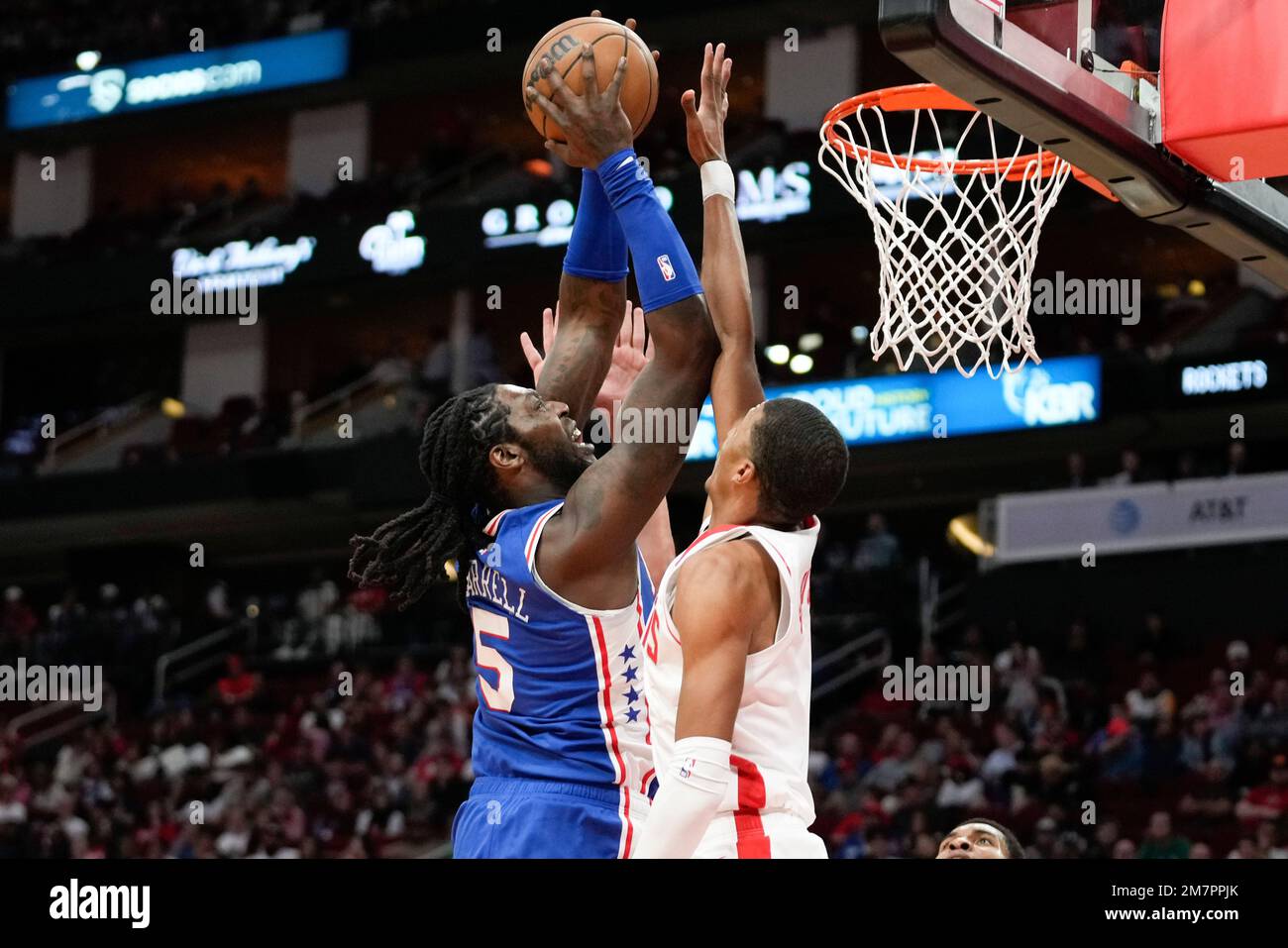 Philadelphia 76ers center Montrezl Harrell, left, shoots as Houston ...