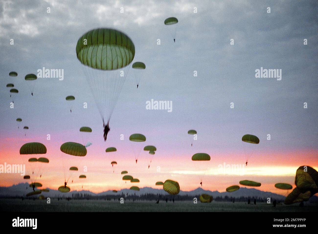Korean paratroopers descend toward a drop zone during exercise Purple ...