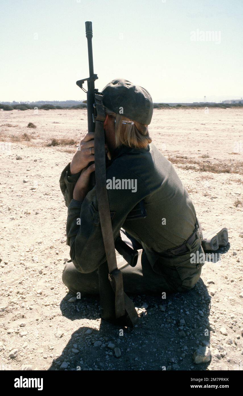 A Prime Beef team member rests after participating in combat training ...