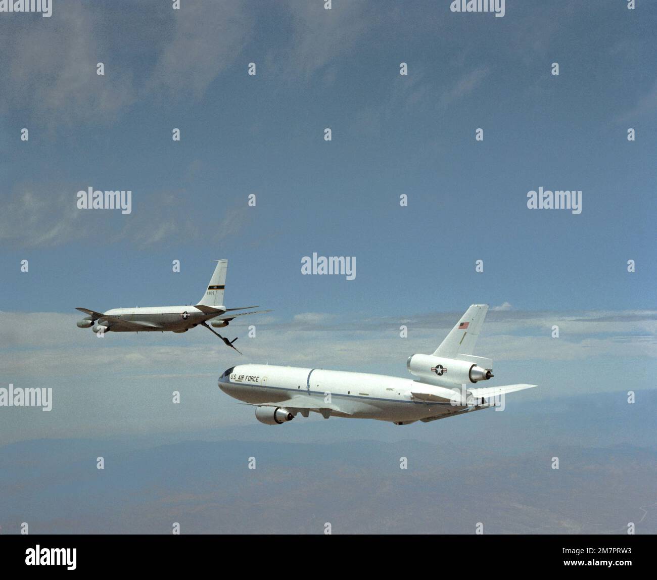 AN air-to-air left side view of a KC-135 Stratotanker aircraft, top ...