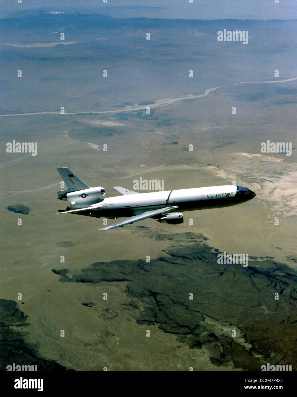 AN air-to-air right side view of a KC-10 Extender aircraft. Country ...