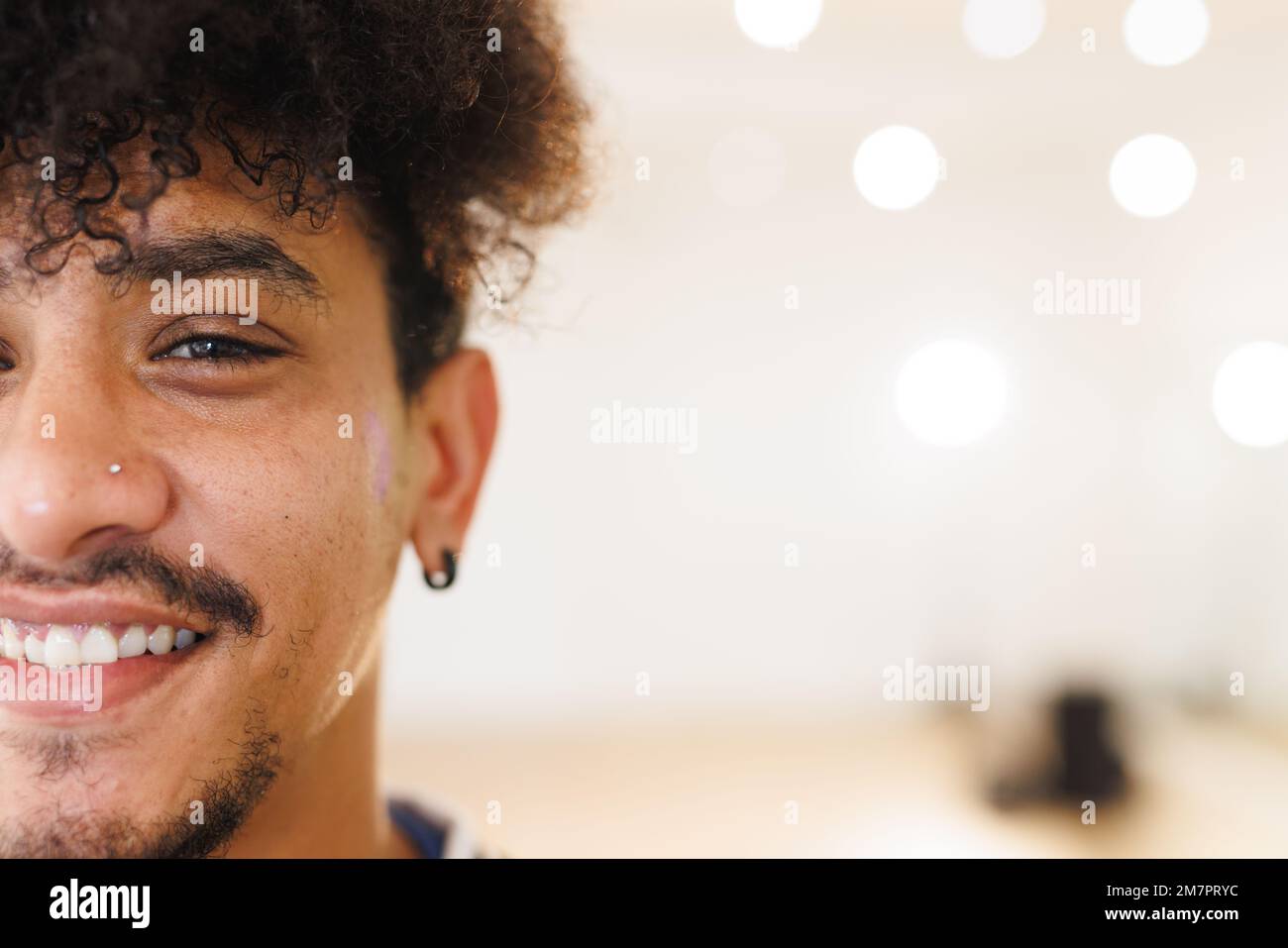 Image of happy biracial male hip hop dancer posing to camera with copy ...