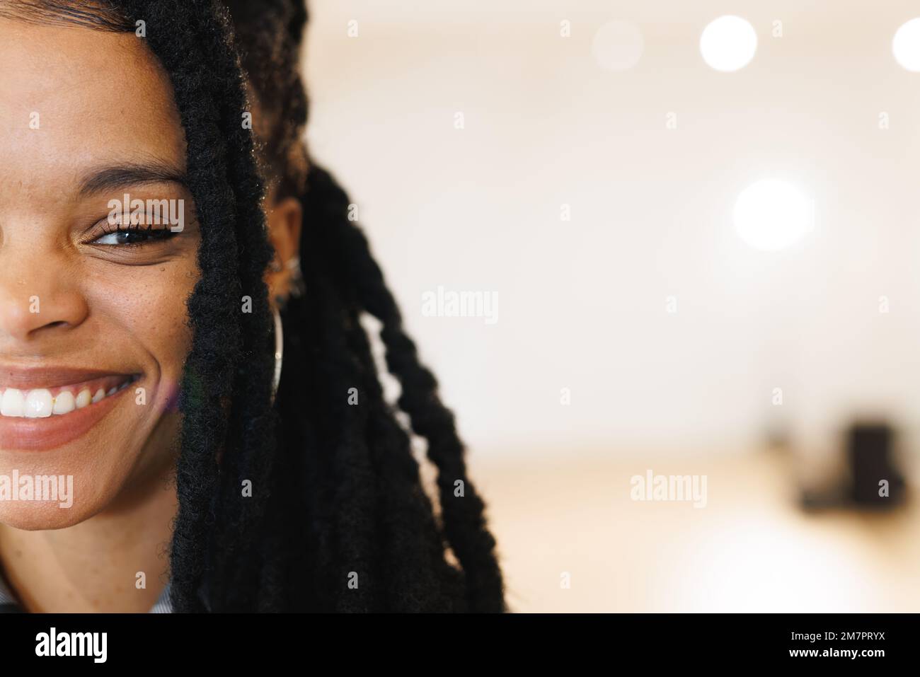 Image of happy african american female hip hop dancer posing to camera ...