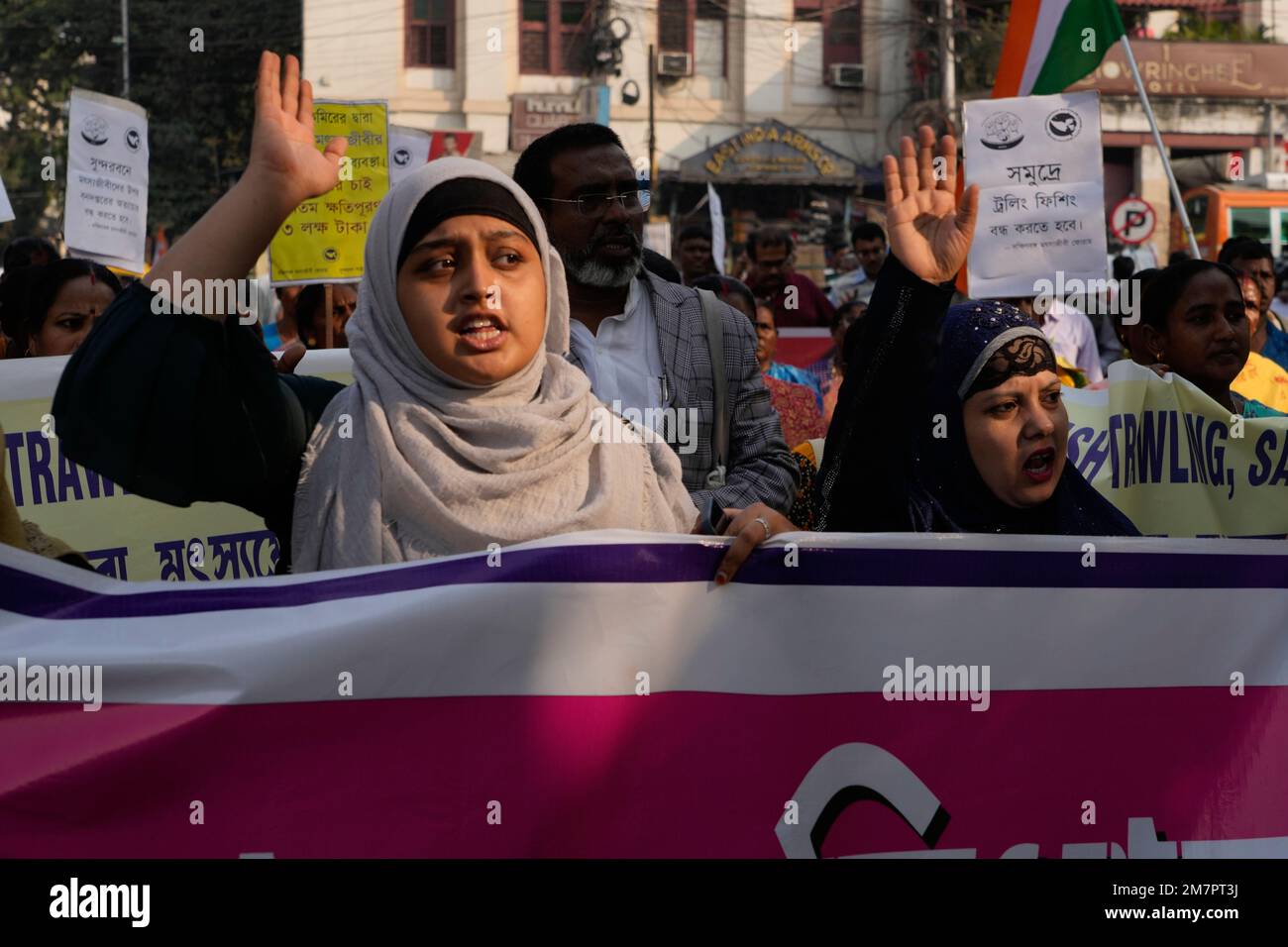 Muslim women shout slogans during a protest to mark the anniversary of ...