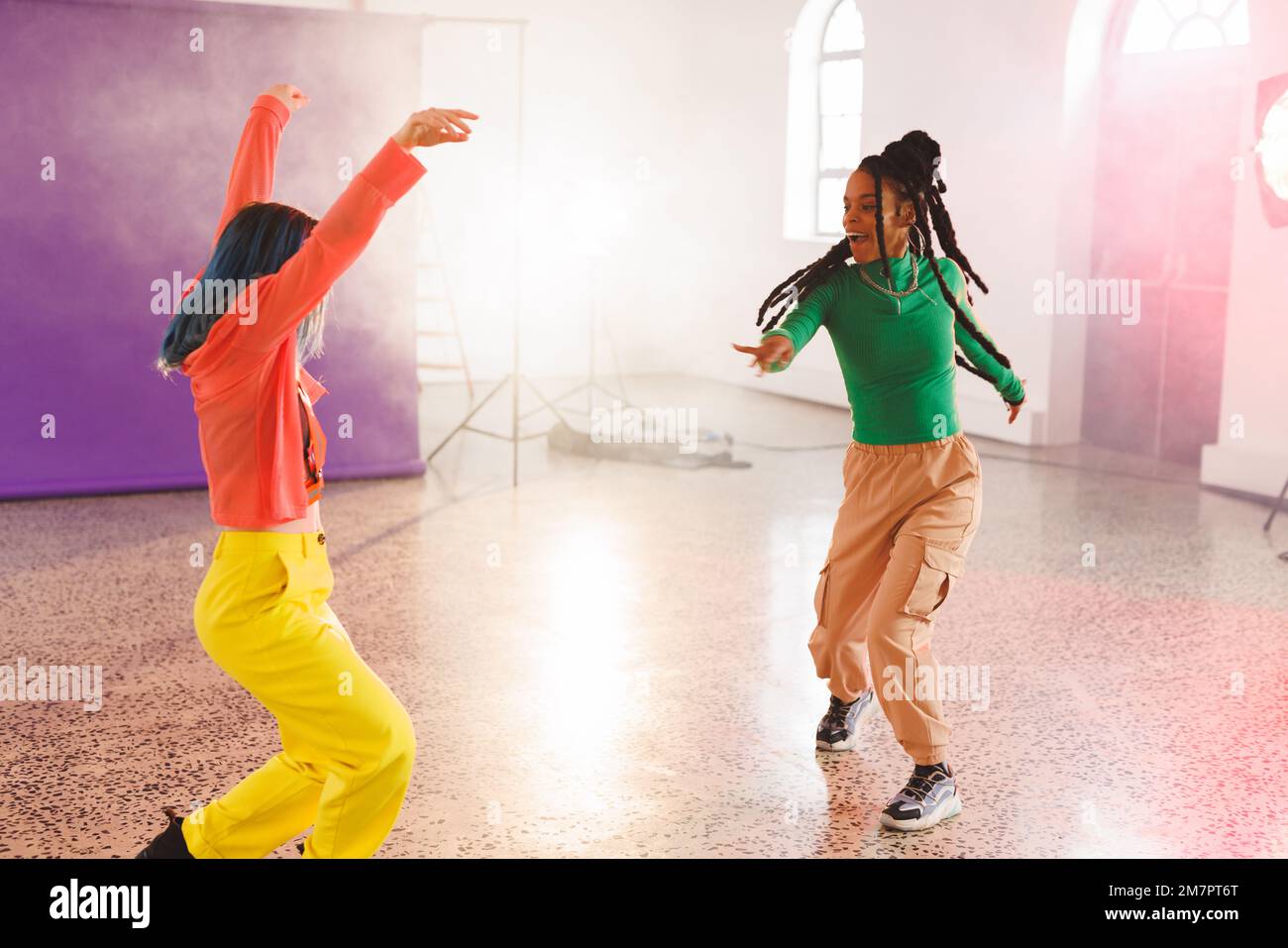 Image of group of two happy diverse female hip hop dancers in studio Stock Photo - Alamy