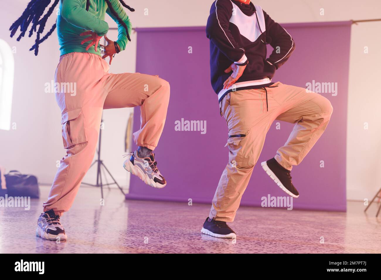Image of low section of diverse female and male hip hop dancers in ...