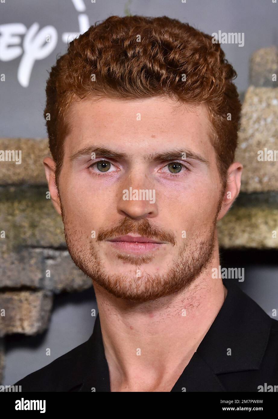 Jake Austin Walker arrives at a red carpet event for "National Treasure: Edge of History ...