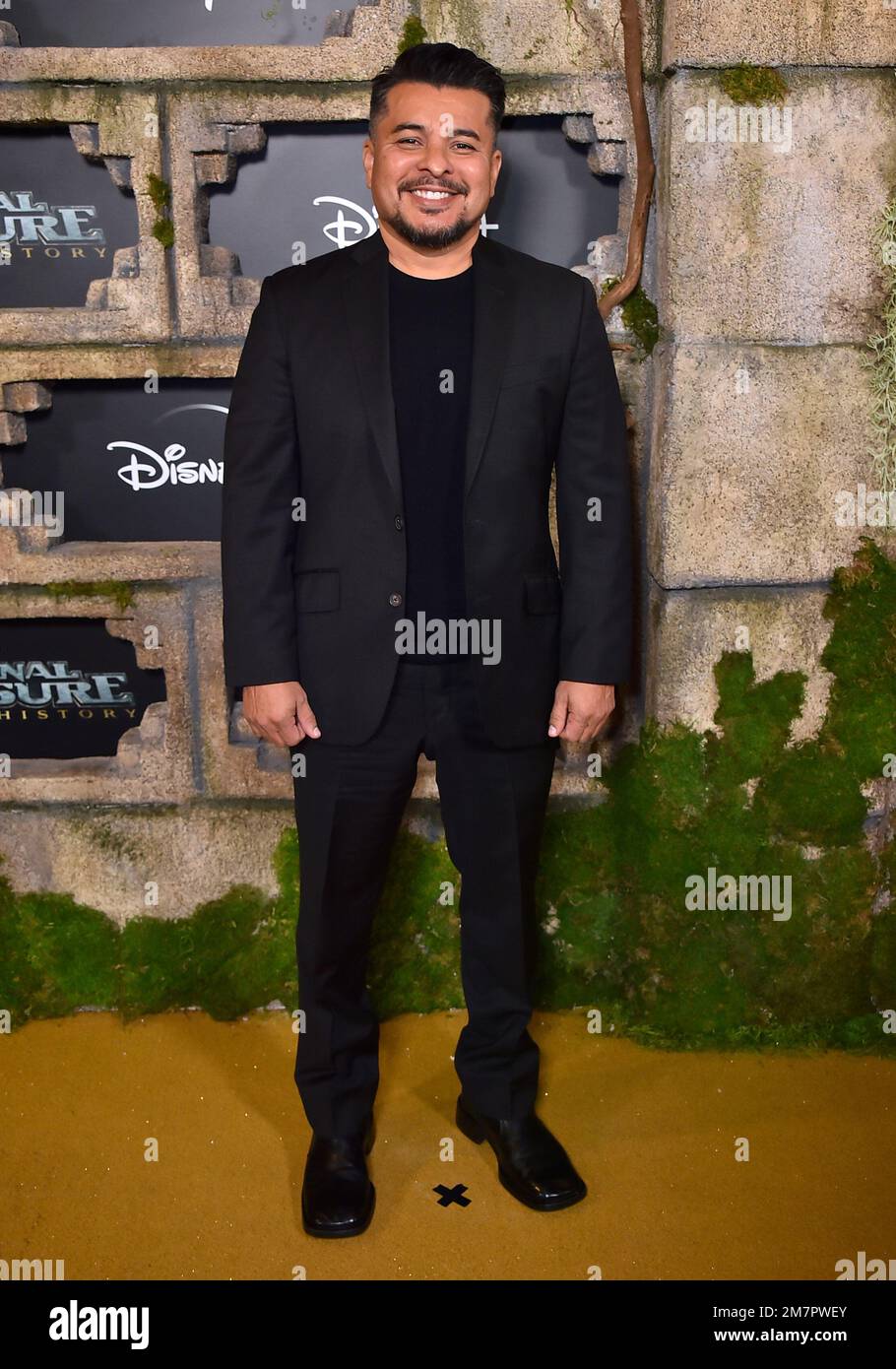 Jacob Vargas arrives at a red carpet event for "National Treasure: Edge ...