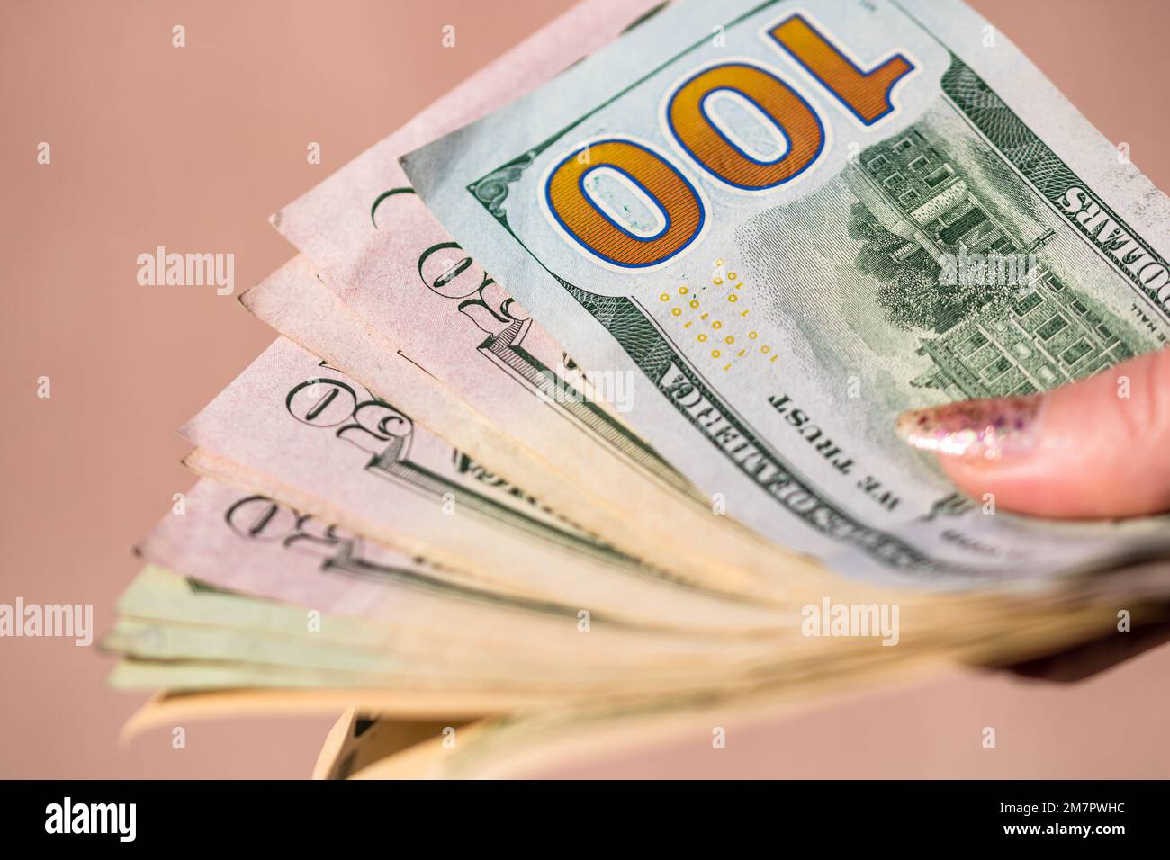 Selective focus on detail of USD banknotes. Counting or giving United ...