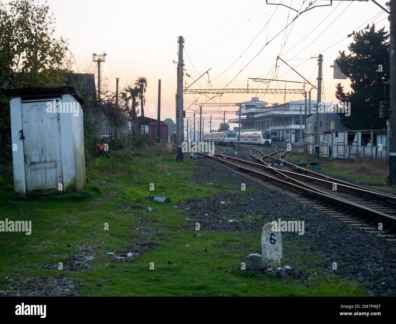 Outdoor wooden toilet at the railway station. Transport node. Trains ...
