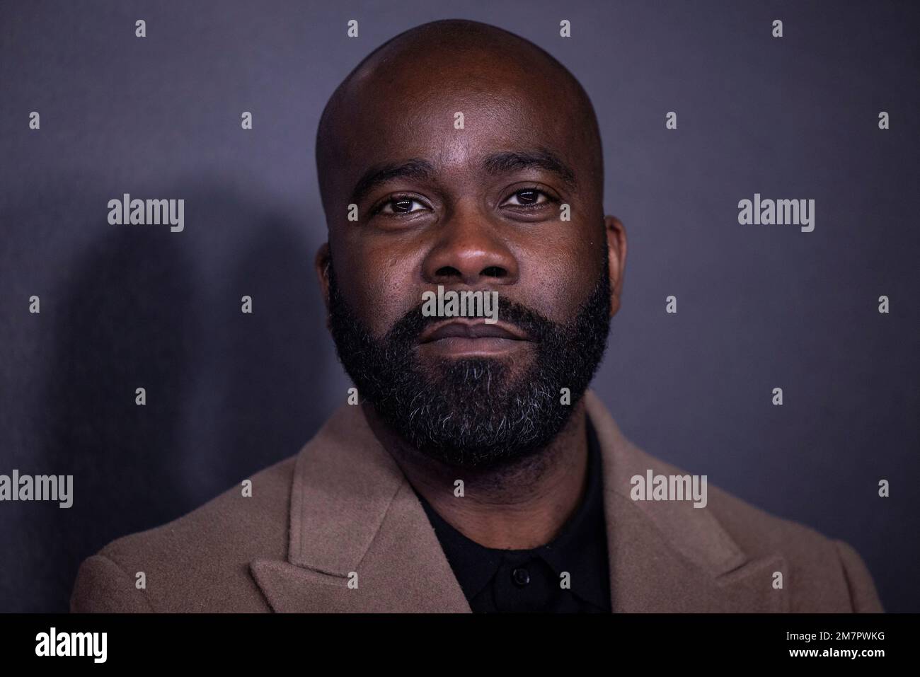 Melvin Odoom poses for photographers upon arrival for the premiere of ...