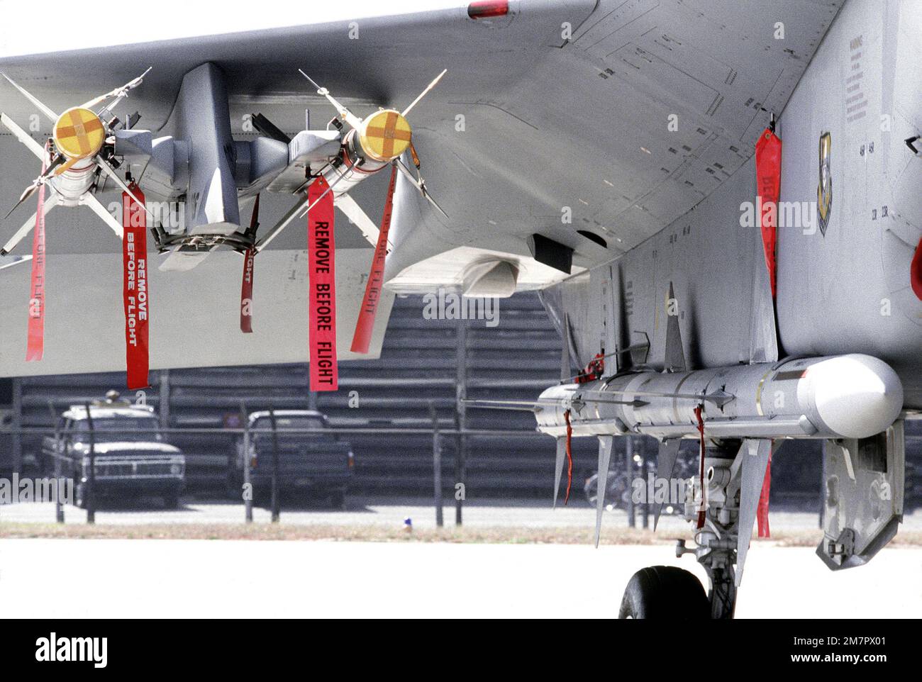 A close-up view of AIM-9L Sidewinder air-to-air missiles, under wing ...