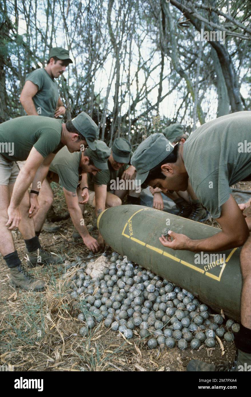 Combat control team (CCT) members familiarize themselves with one of ...