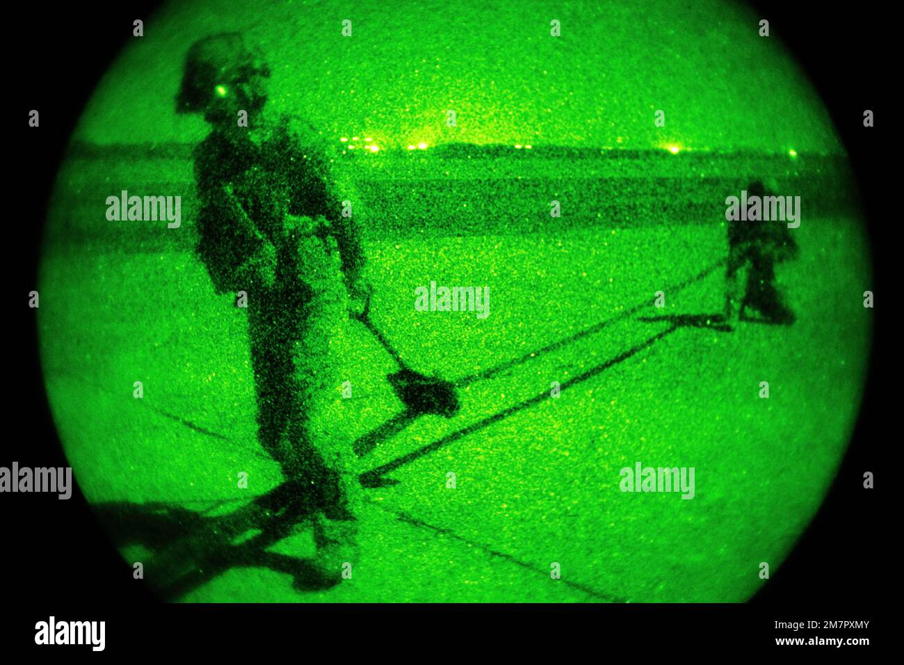 A U.S. Air Force Airman with the 352d Special Operations Wing squeegees ...