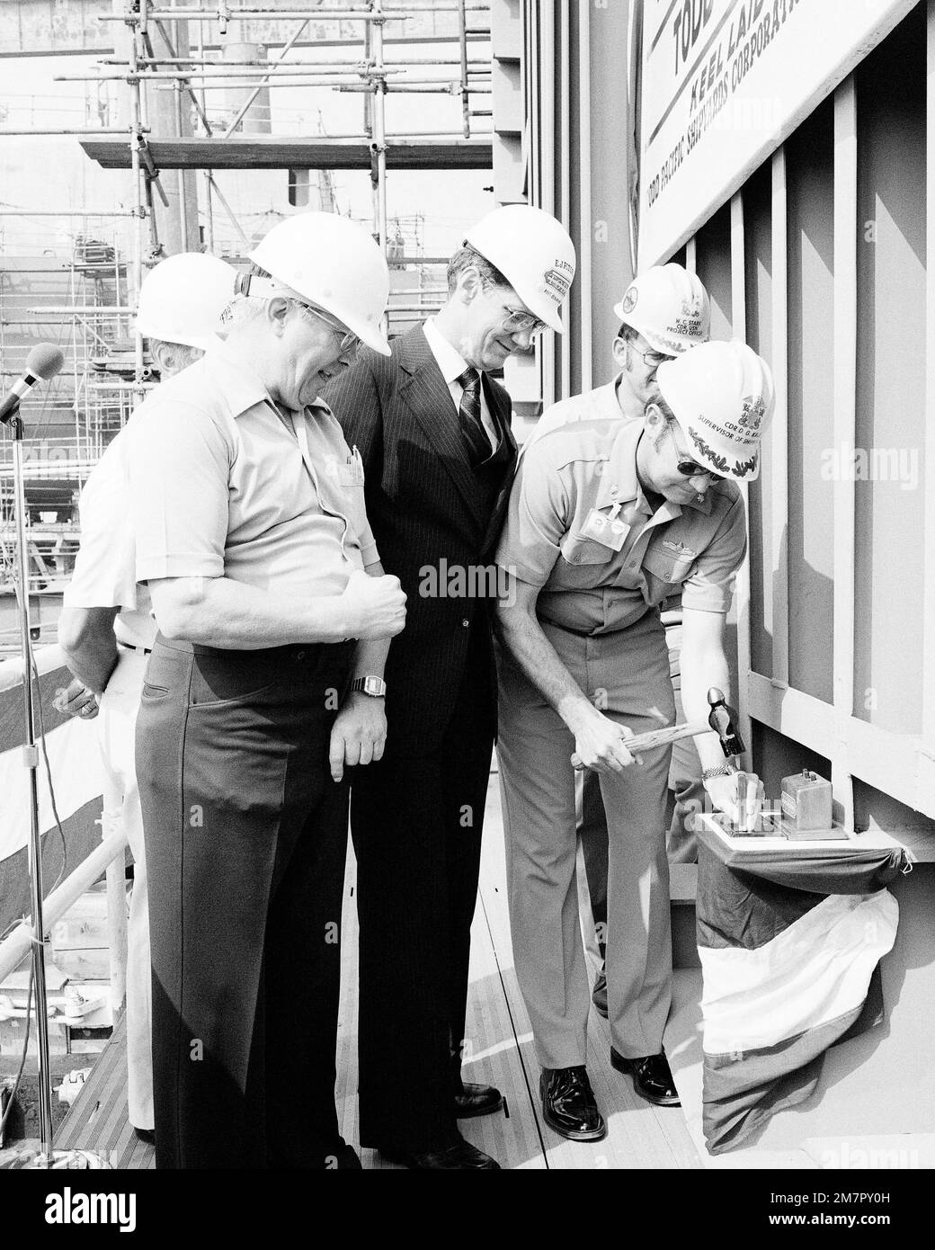 Commander D.G. Kalb, supervisor of shipbuilding, right, certifies the ...
