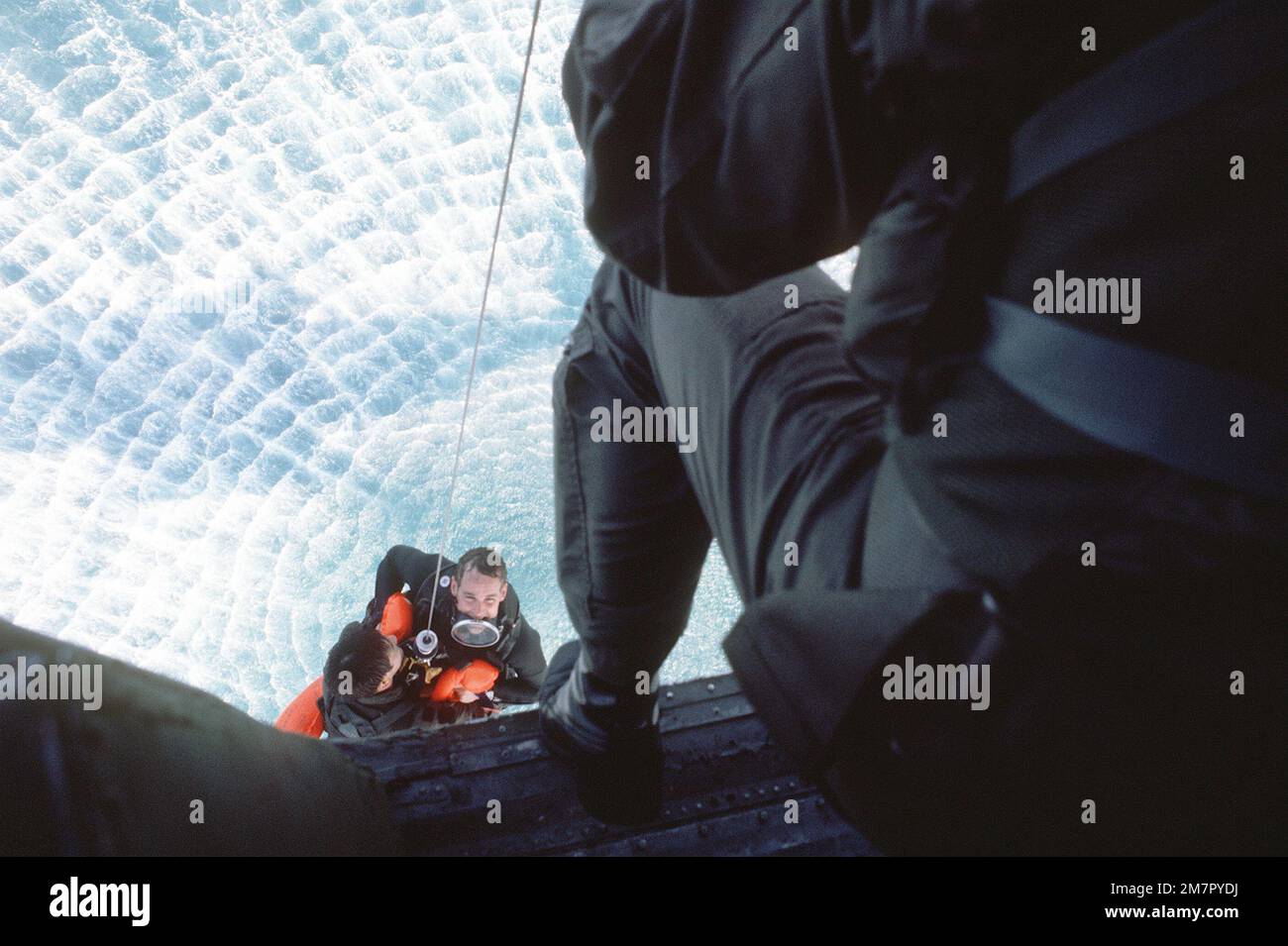 A "survivor" is picked up from the water during Operation Cope Angel ...