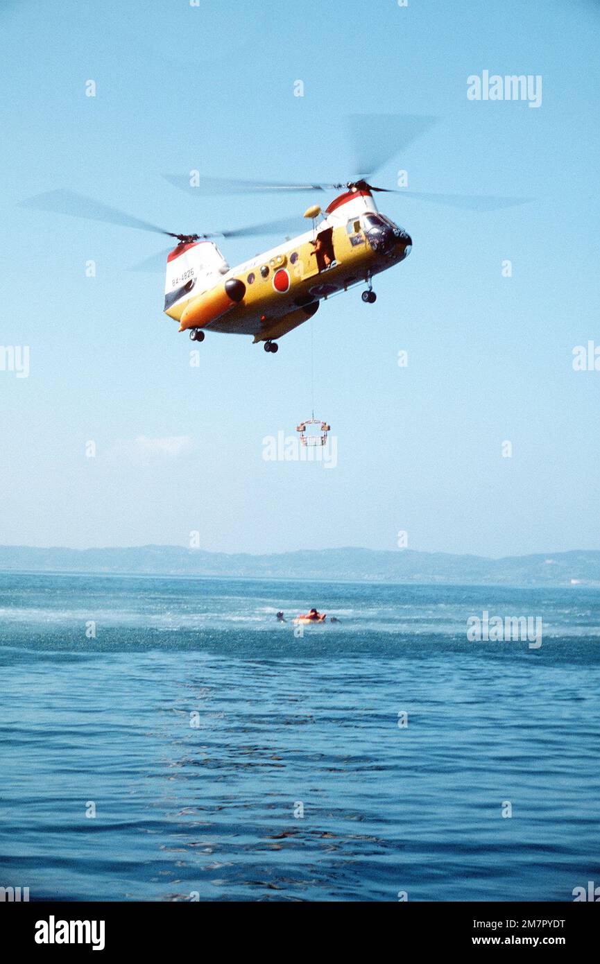 AN H-46 helicopter from the Japanese Air Self Defense Force picks up a ...