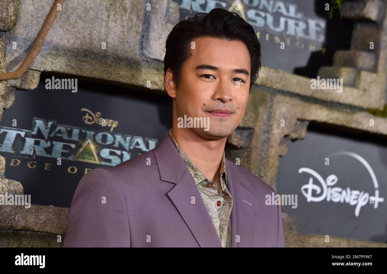 Jordan Rodrigues arrives at a red carpet event for "National Treasure ...